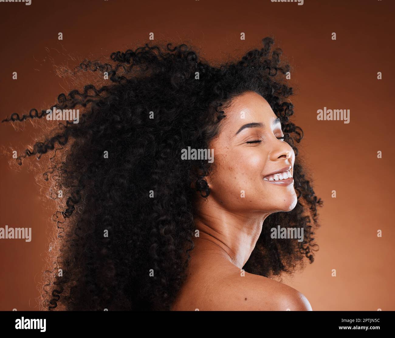 Hair care, black woman and cosmetics with smile, happy and relax on ...