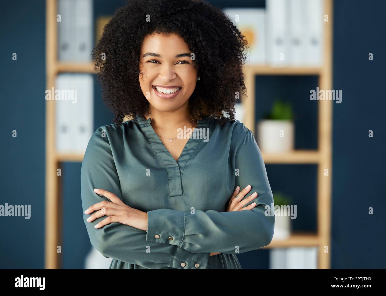 Business, black woman and portrait, arms crossed and pride, confidence and motivation for career ...