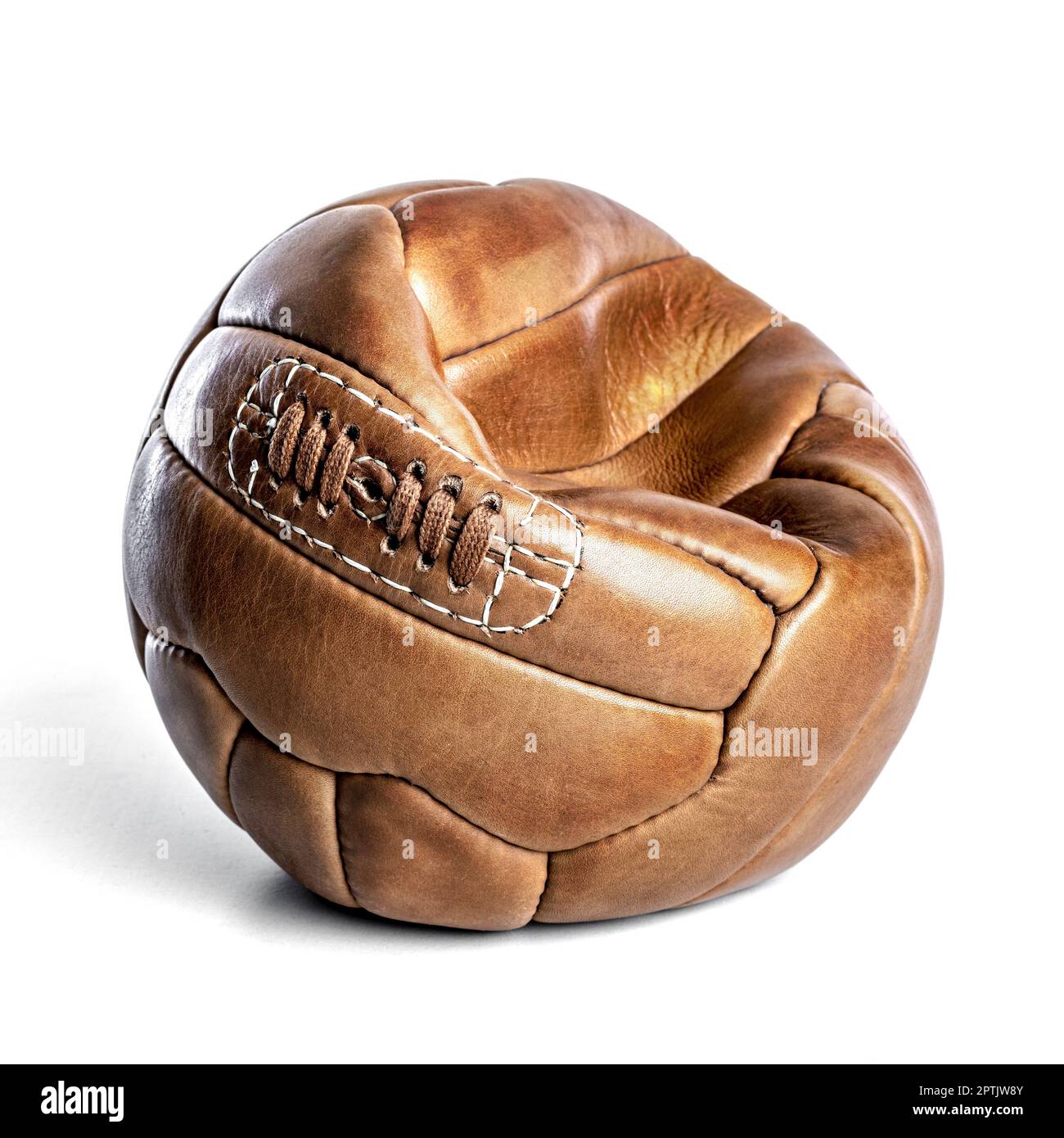 deflated vintage soccer ball on a white background Stock Photo - Alamy