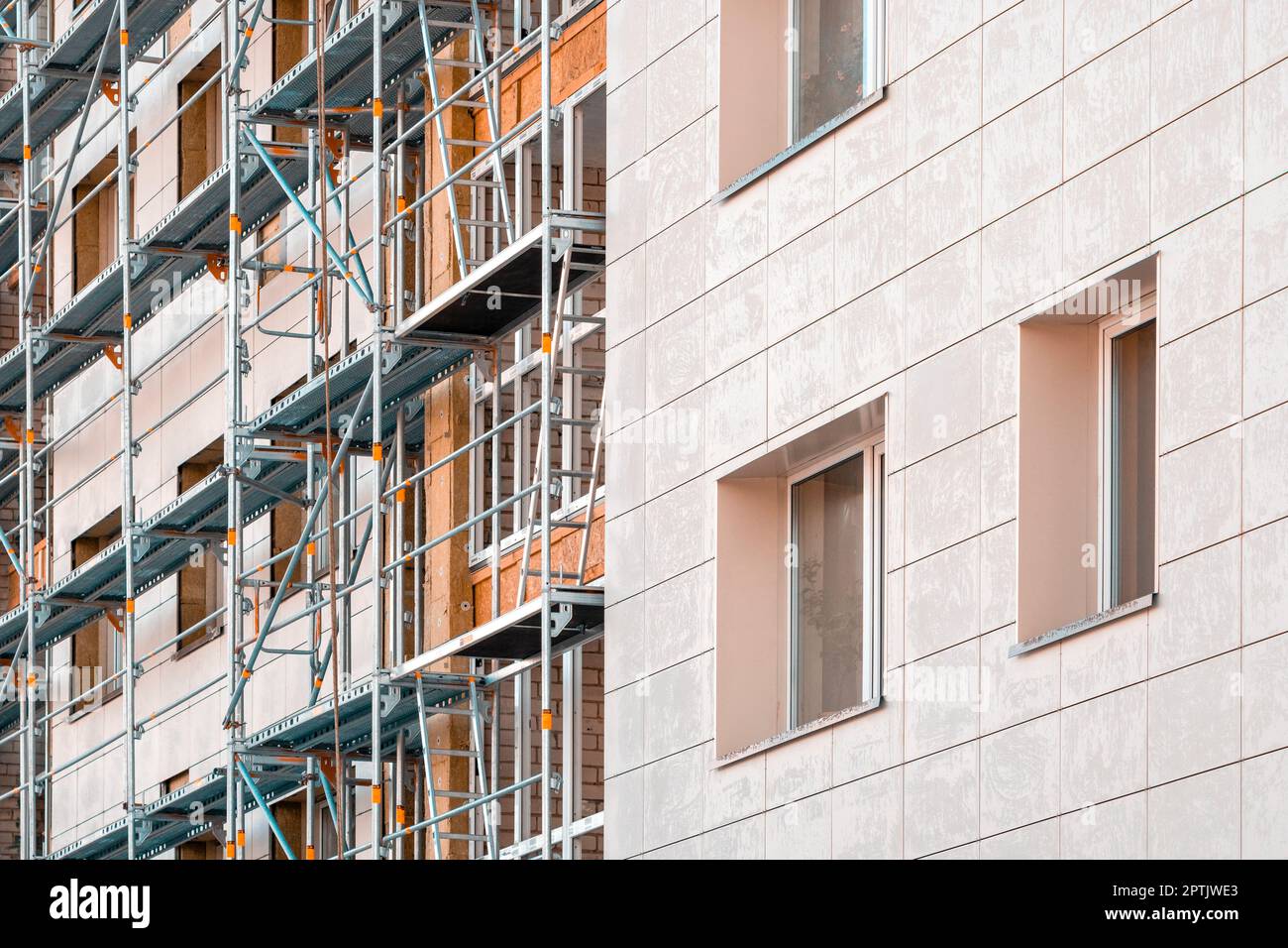 Installation of external wall thermal insulation with rock wool ...