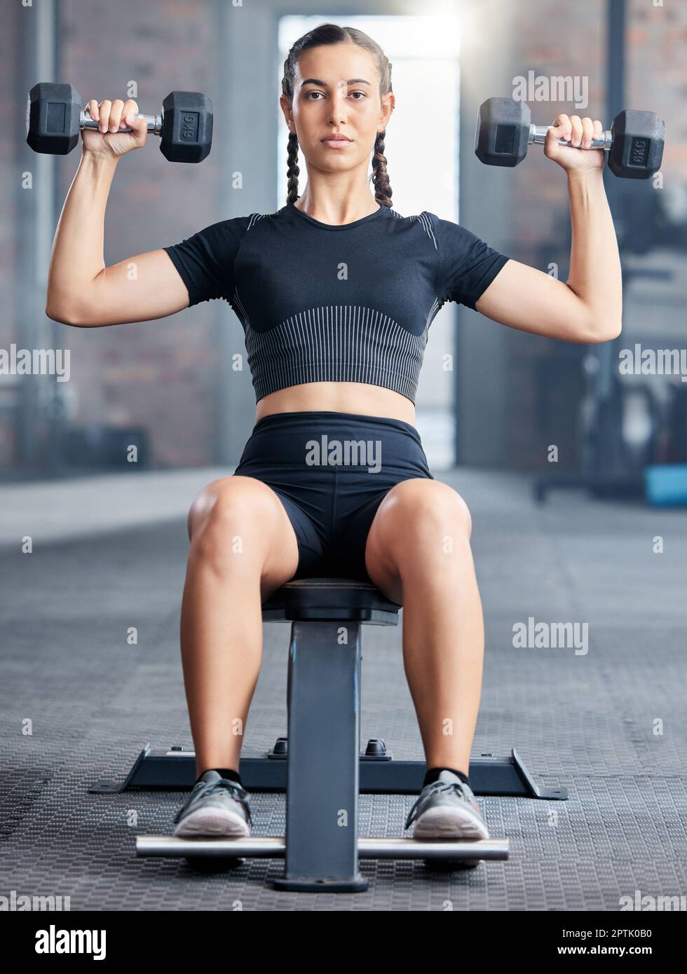 Woman, fitness and weightlifting in wellness gym for healthcare motivation and bodybuilding ...