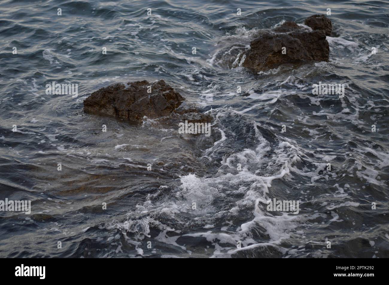 Sea waves crashing into rocks.Sea waves crashing into rocks. Storm at ...