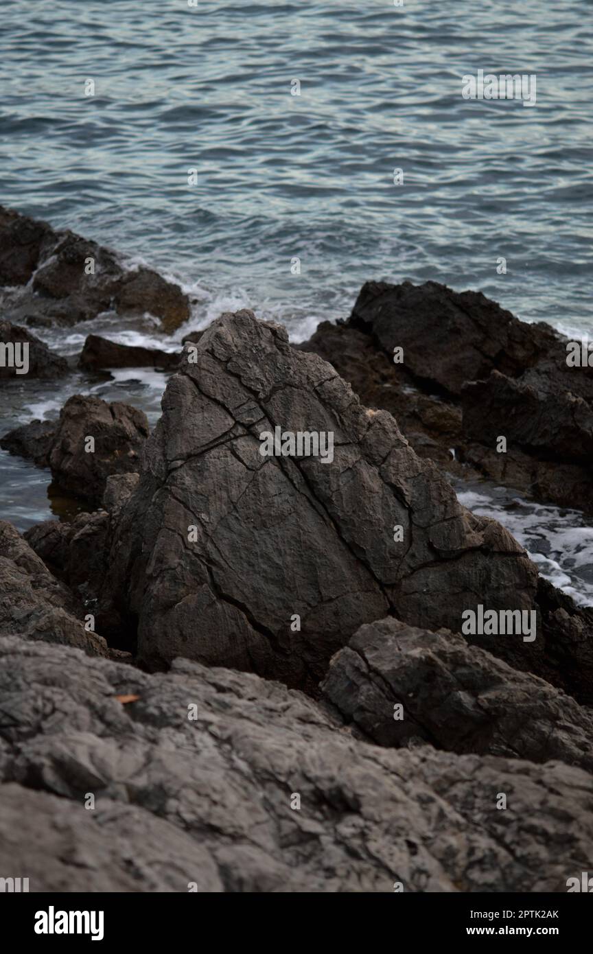 Sea waves crashing into rocks.Sea waves crashing into rocks. Storm at ...