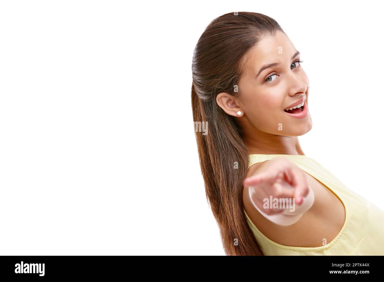 There can only be one. Studio shot of a confident young woman pointing ...