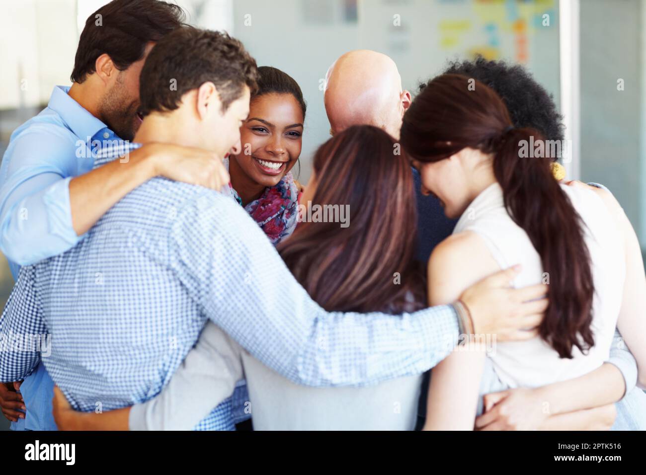 Group hug management hi-res stock photography and images - Alamy