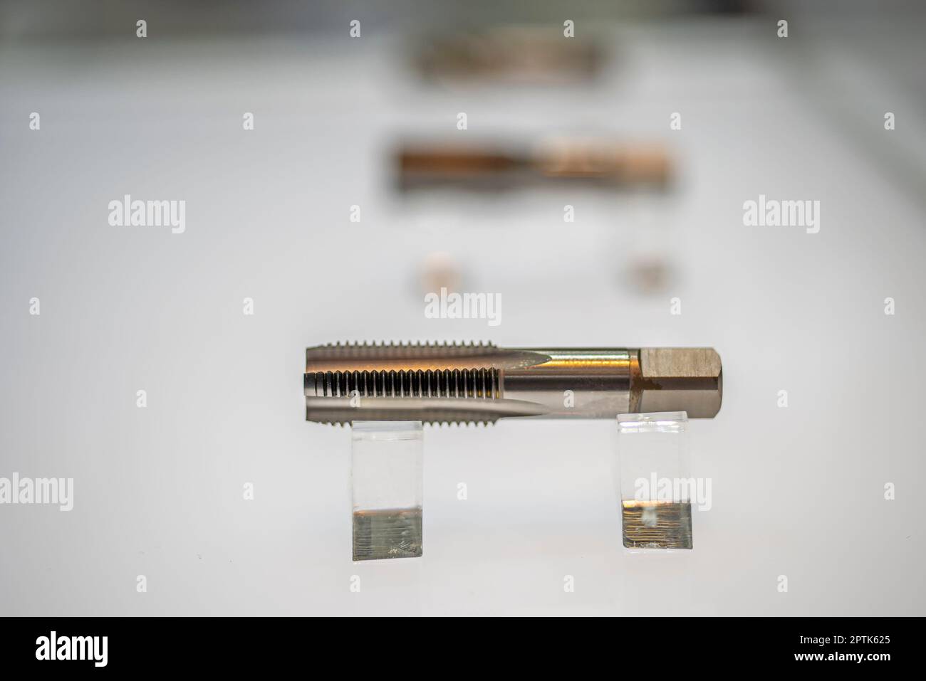 Machine tool tapping screw or threaded process Stock Photo - Alamy