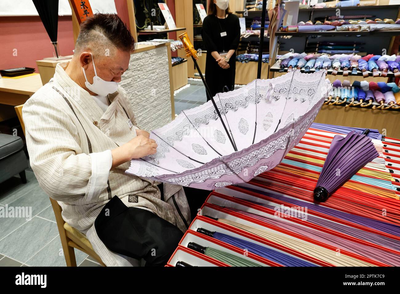 April 26, 2023, Tokyo, Japan: A Japanese umbrella maker is seen at his ...