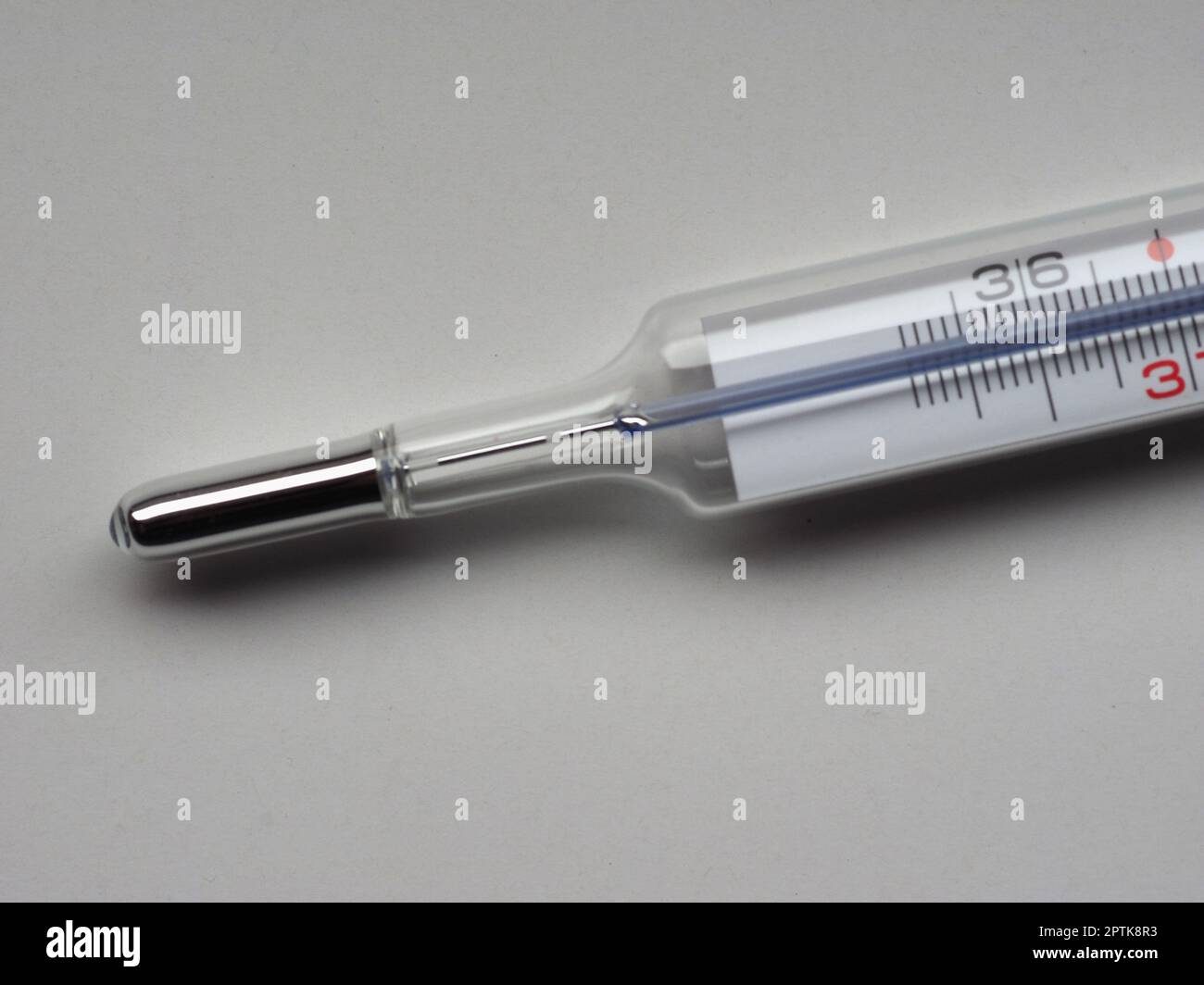 analog thermometer to measure the body temperature Stock Photo - Alamy