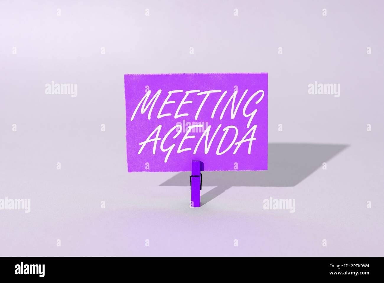 Hand writing sign Meeting Agenda, Word Written on An agenda sets clear ...