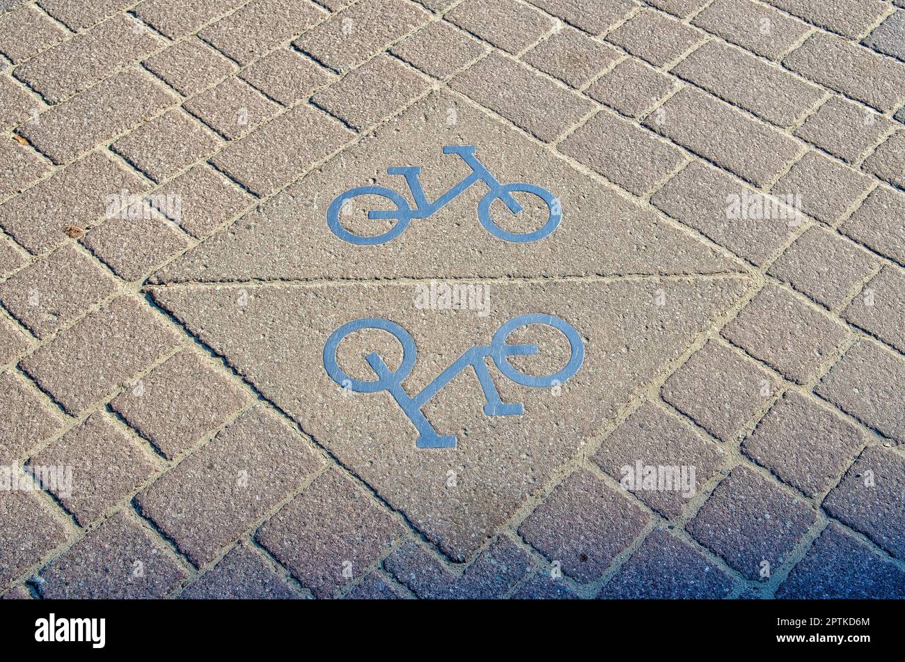 Cycle path, bicycle symbol as a lane marking or road marking on a road ...