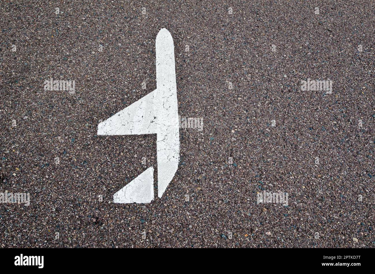 Airplane symbol as lane marking or road marking on a road Stock Photo ...