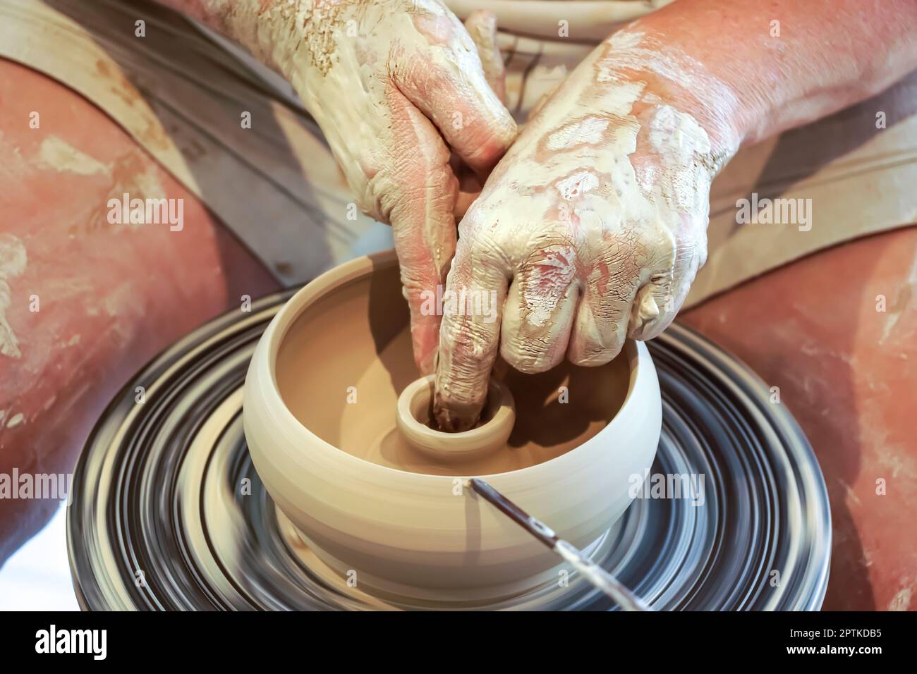 Potter at work in the pottery workshop Stock Photo - Alamy