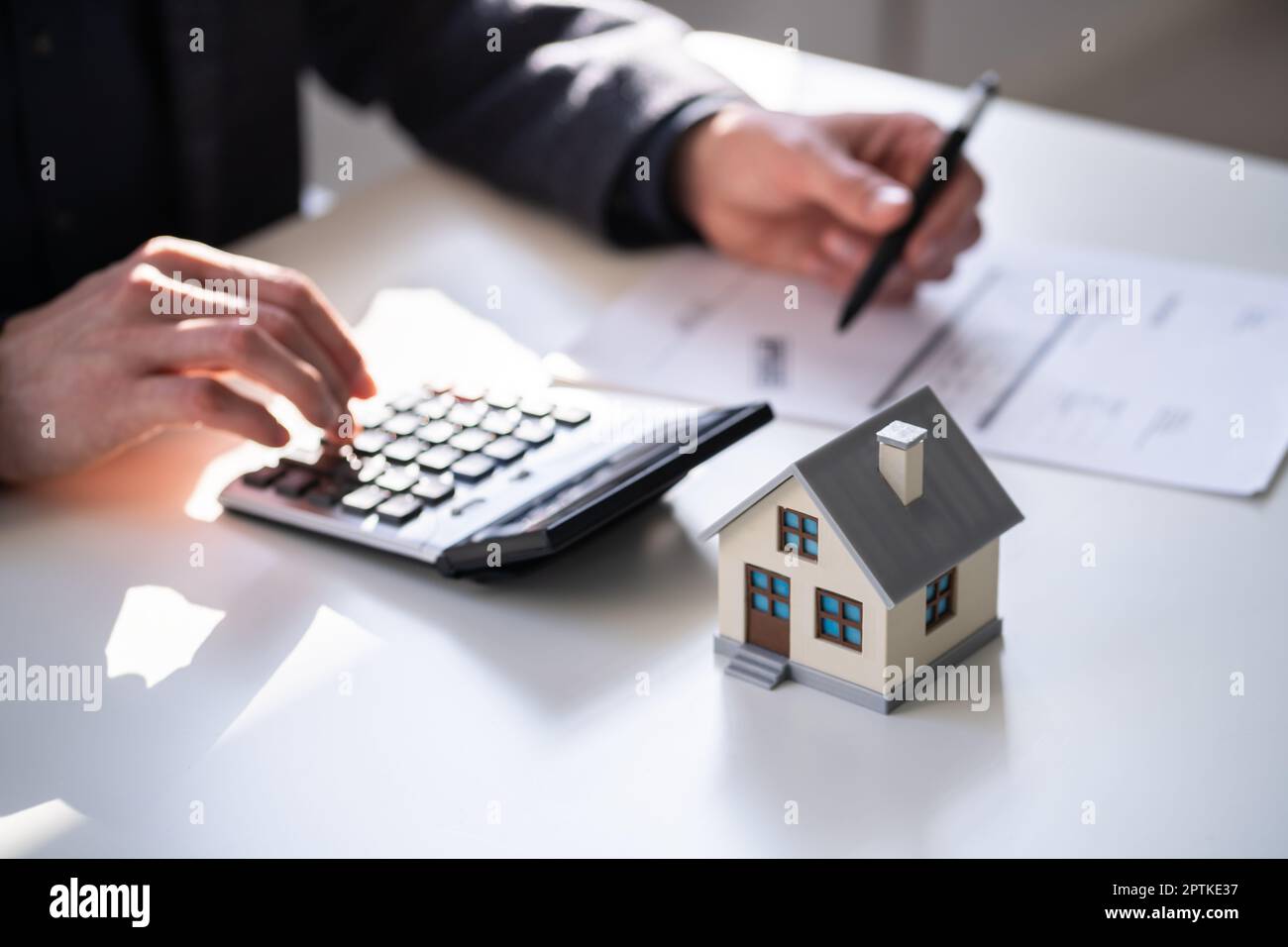 Calculating Asset Property Tax. Real Estate House Stock Photo - Alamy
