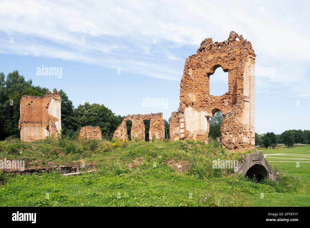 Ruin of old abandoned brick castle in natural environment in summer ...