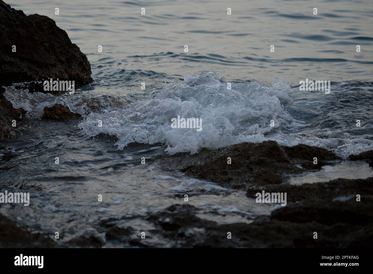 Sea waves crashing into rocks. Storm at the sea, dark, moody photo ...