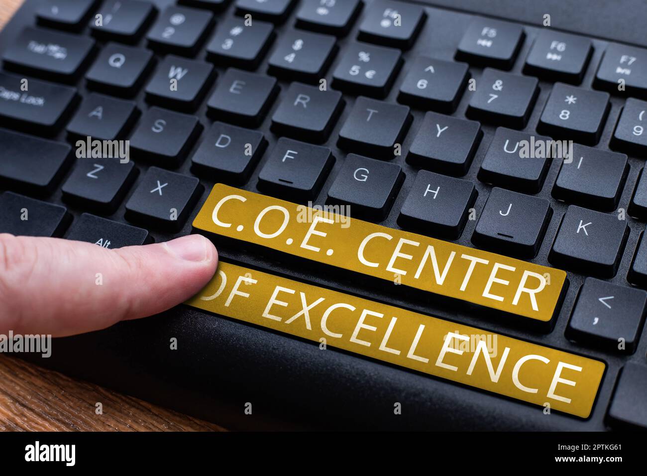Hand writing sign C.O.E. Center Of Excellence, Concept meaning being ...