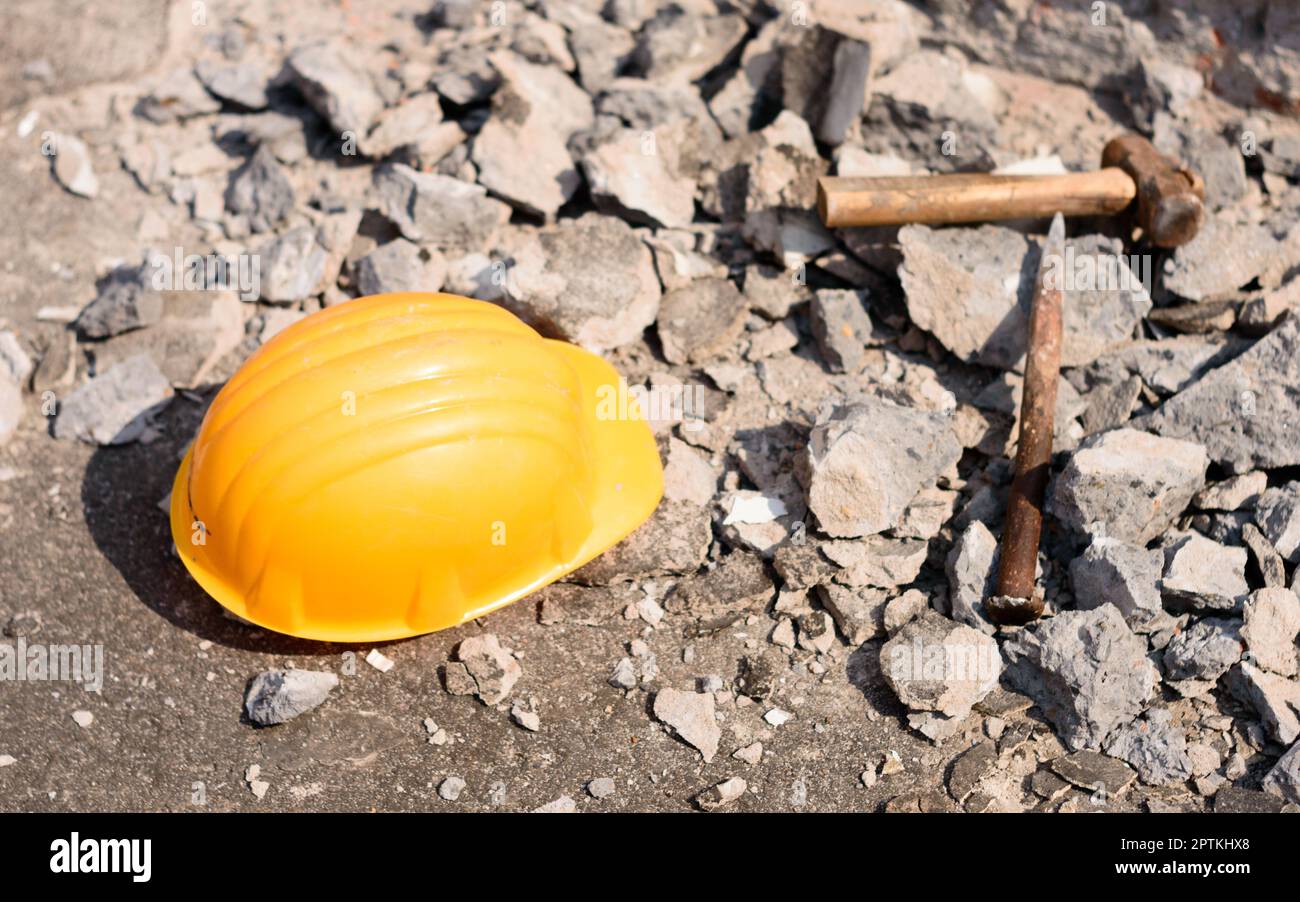 Safety Helmet in Construction Site. Yellow Hat. Safety Precautions ...