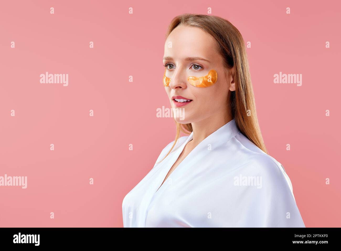 Beautiful lady with mask for the skin around the eyes in profile Stock ...