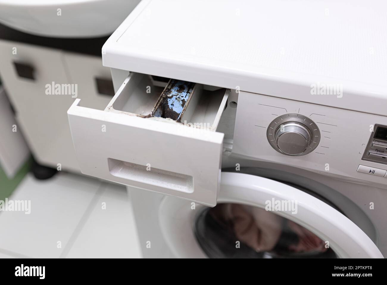 Washing machine dispenser compartment container with corroded, moldy ...