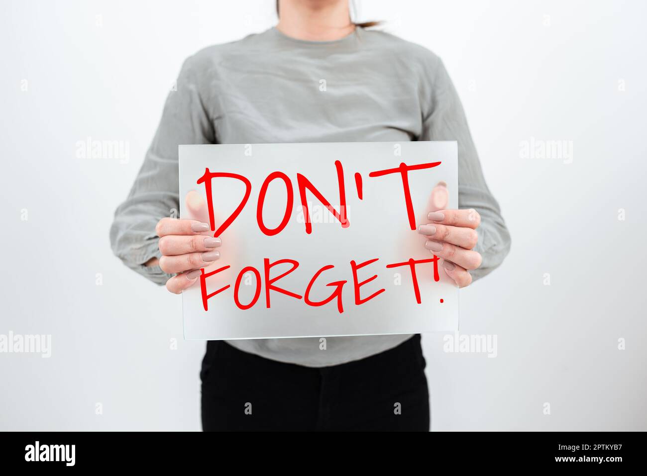 Hand writing sign Don'T Forget, Concept meaning asking someone to keep ...