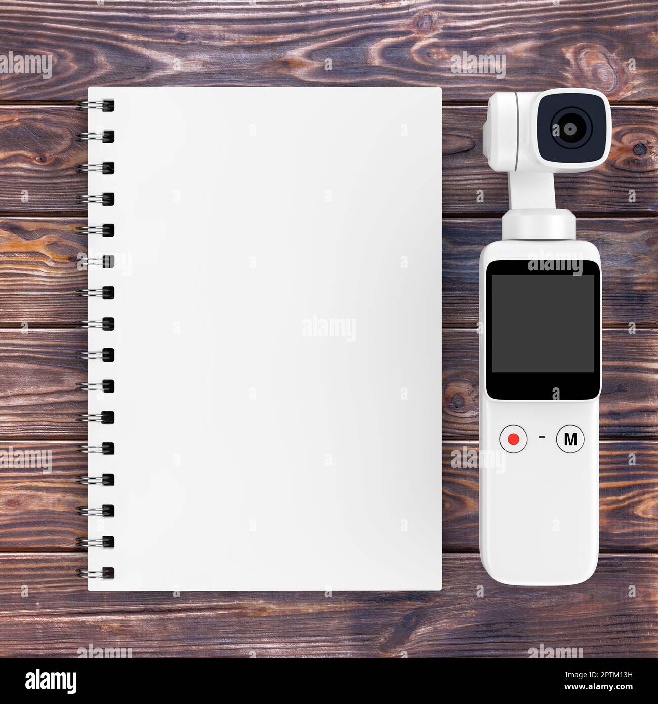 Pocket Handheld Gimbal Action Camera with Blank Note Pad on a plank ...