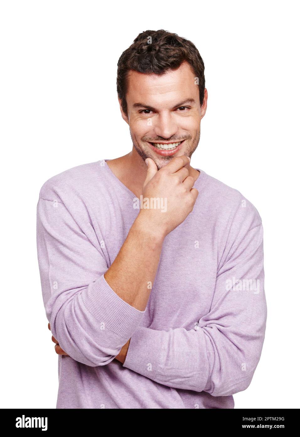 He makes the ladies swoon. A handsome man standing against a white ...