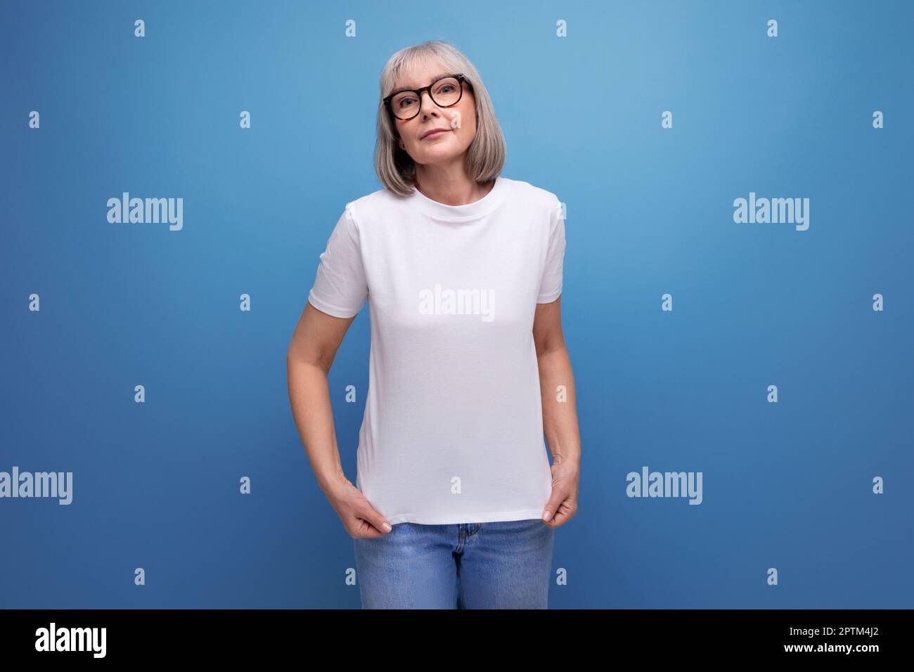 mature lady with bob haircut posing on studio background with mocap ...