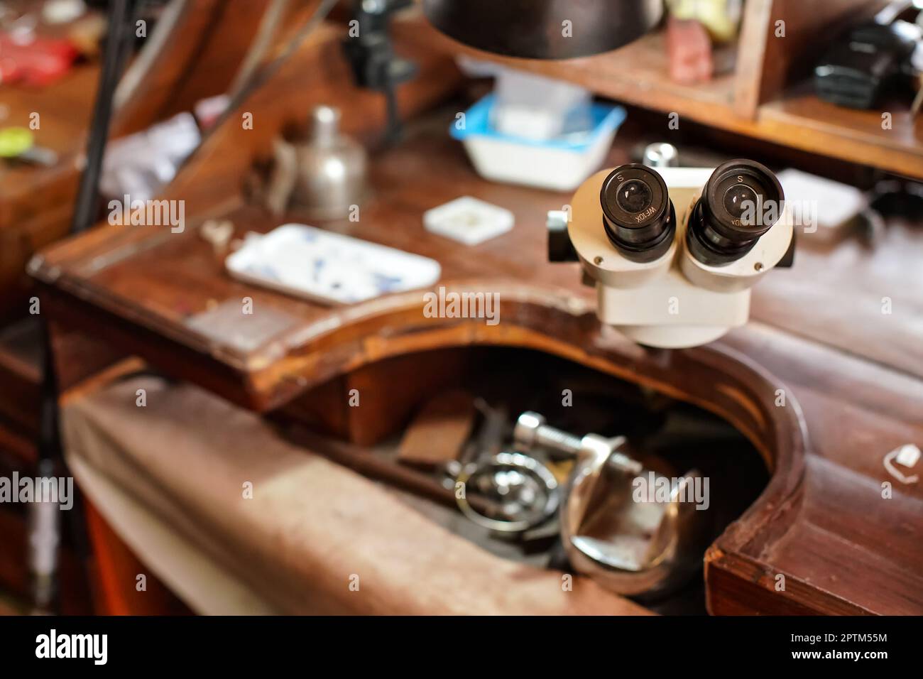 Inspection microscope at jeweller's desk, closeup detail to eyepiece ...