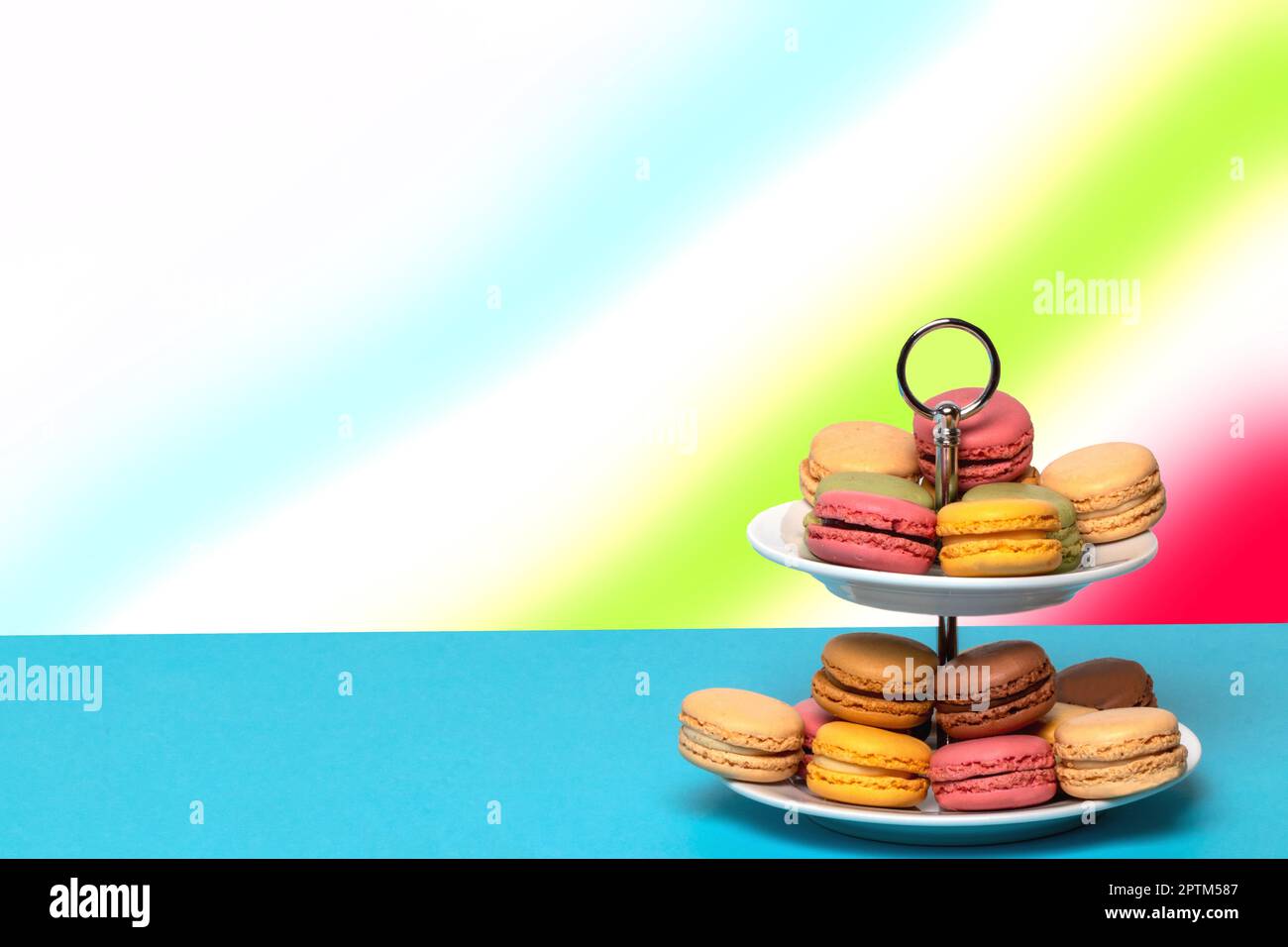 Close-up of colourful French macaroons on a two-storey etagere on a ...