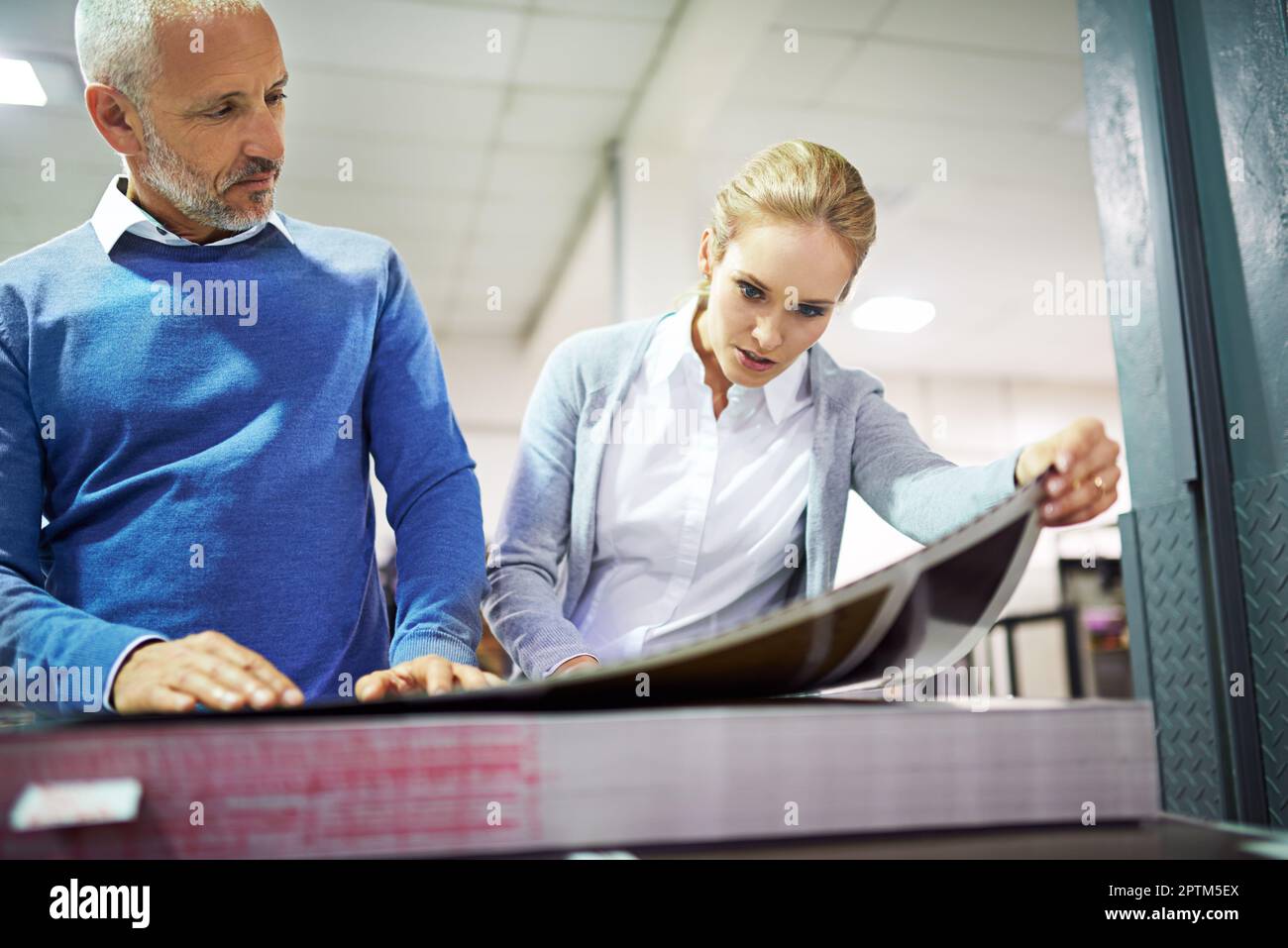Inspecting their work on the factory floor Stock Photo - Alamy