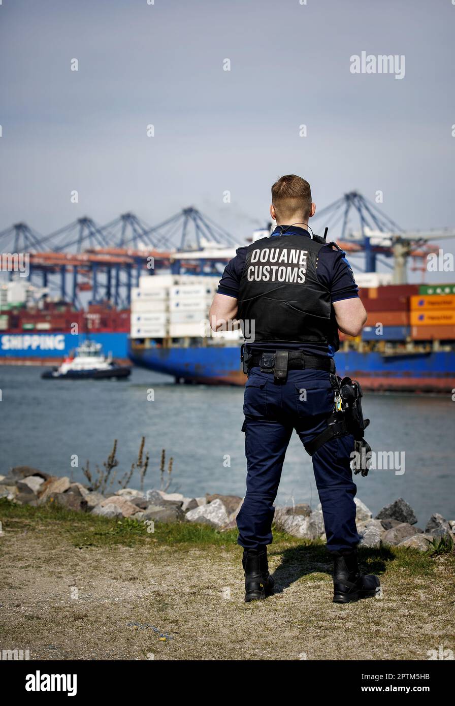 ROTTERDAM - A customs officer of the Port of Rotterdam Customs ...