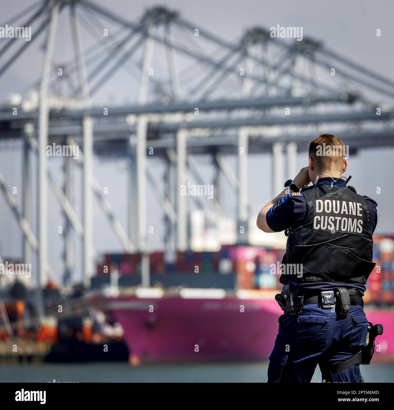 ROTTERDAM - A customs officer of the Port of Rotterdam Customs ...