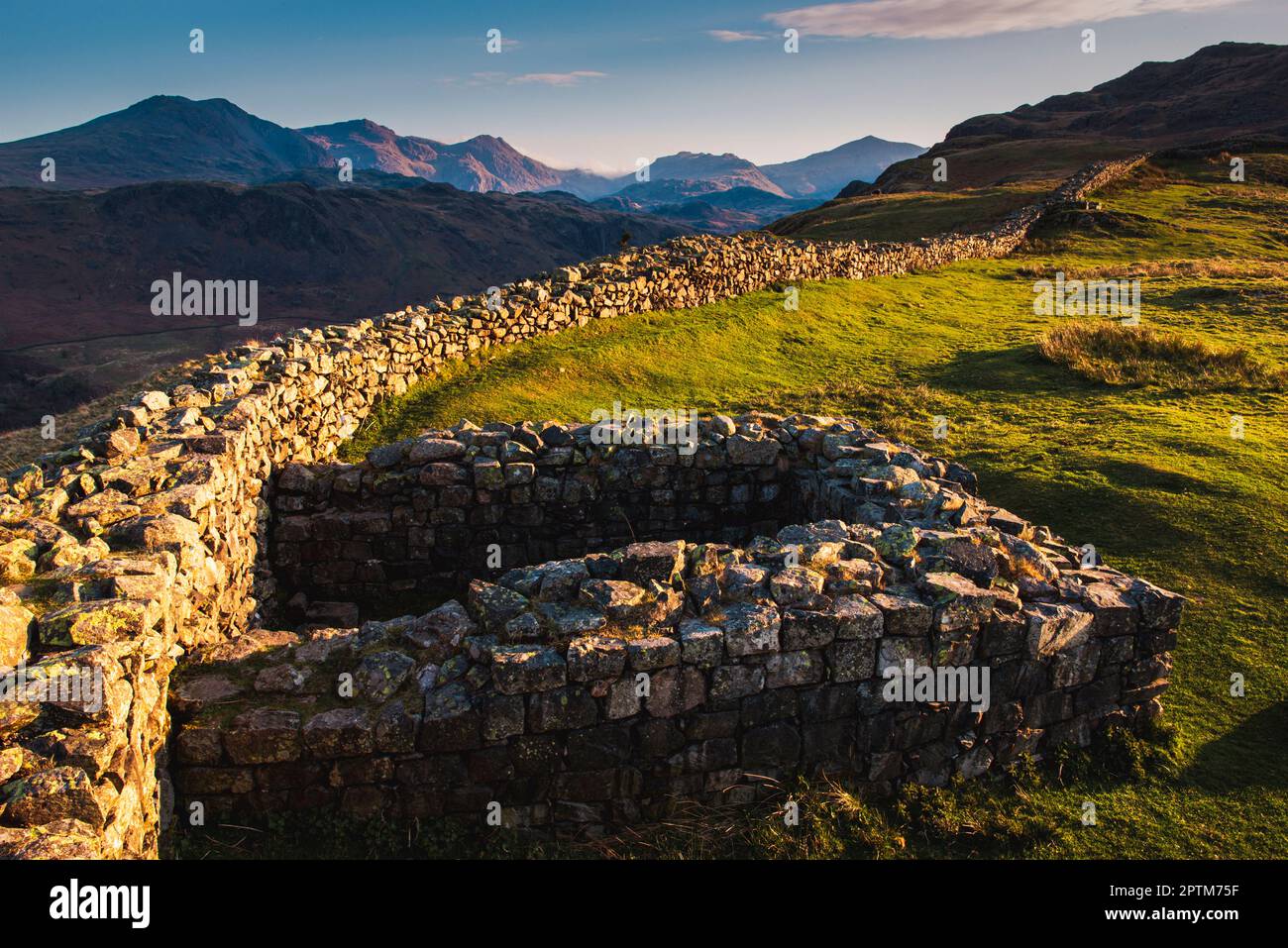 Eskdale valley, the remains of an angle tower and walls of Hardknott ...