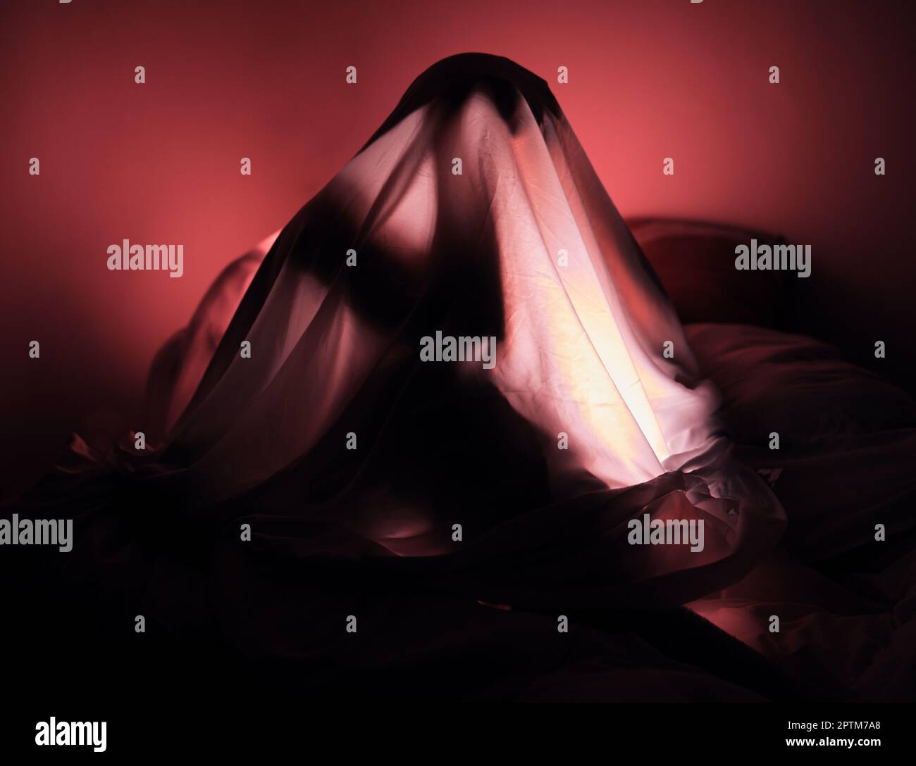 Depression, fear and red with a woman in bed, alone with her thoughts ...