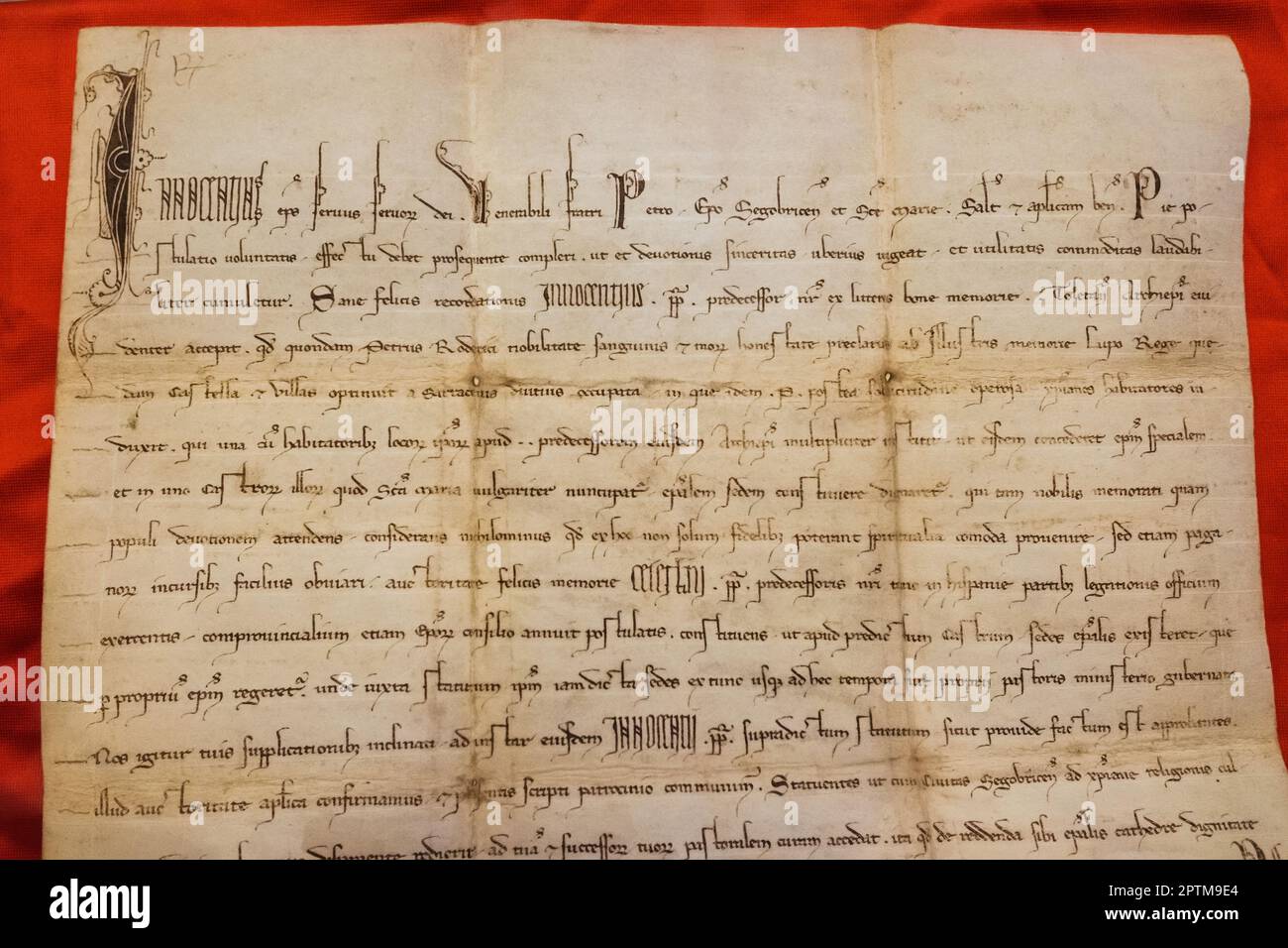 Latin manuscript and crumpled paper on the cathedral of Segorbe Stock ...