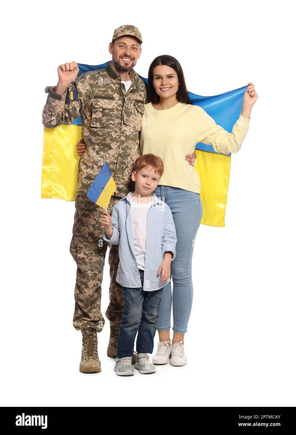 Ukrainian defender in military uniform and his family with flags on ...