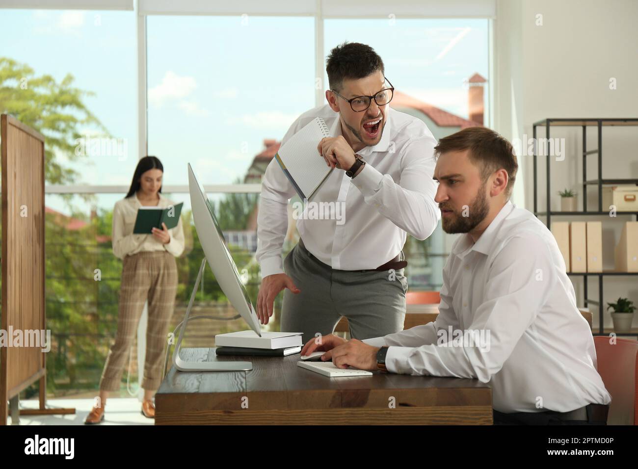 Boss screaming at employee in office. Toxic work environment Stock ...