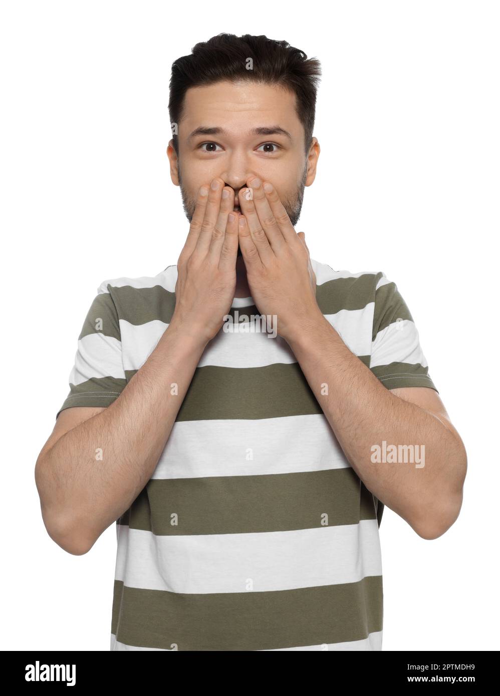 Embarrassed man covering mouth with hands on white background Stock ...