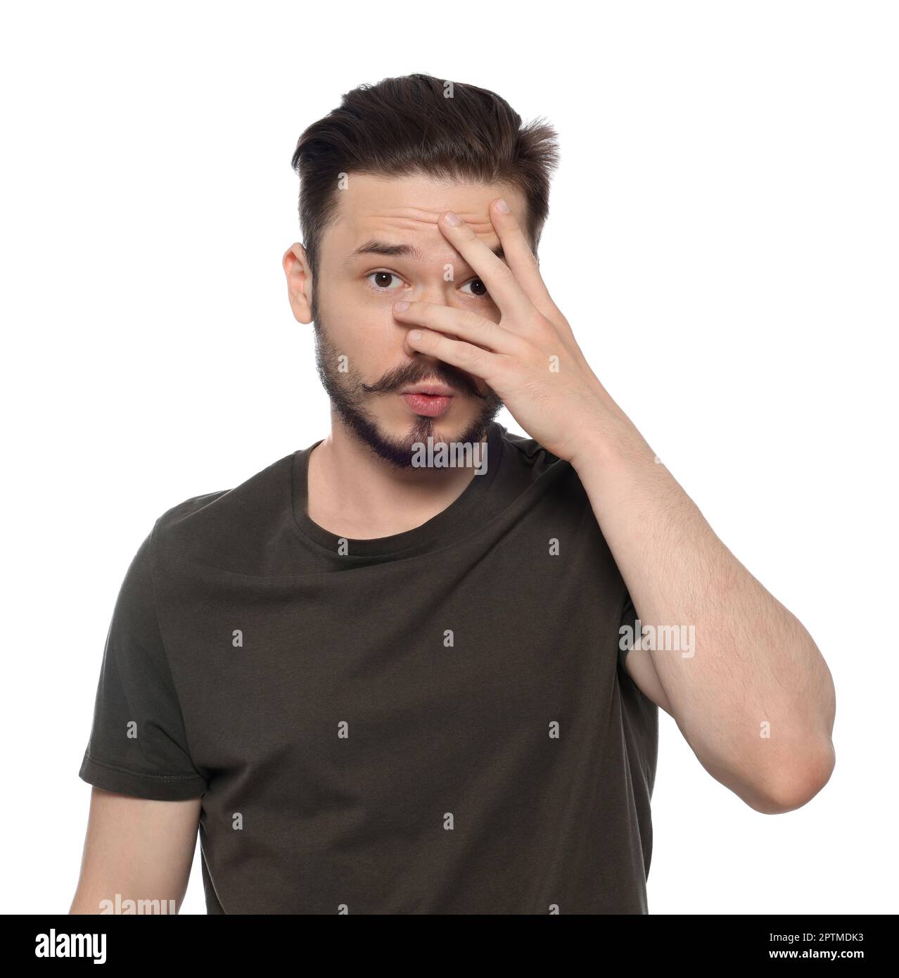 Embarrassed man covering face with hand on white background Stock Photo ...