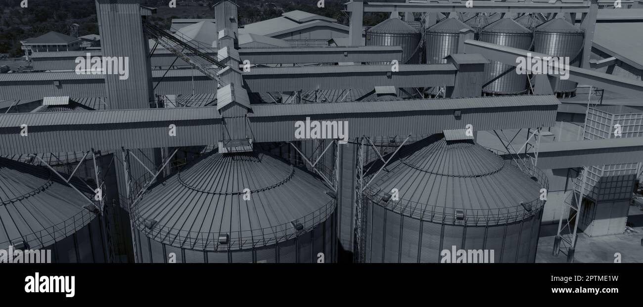 Animal feed factory. Agricultural silo at feed mill factory. Tank for ...