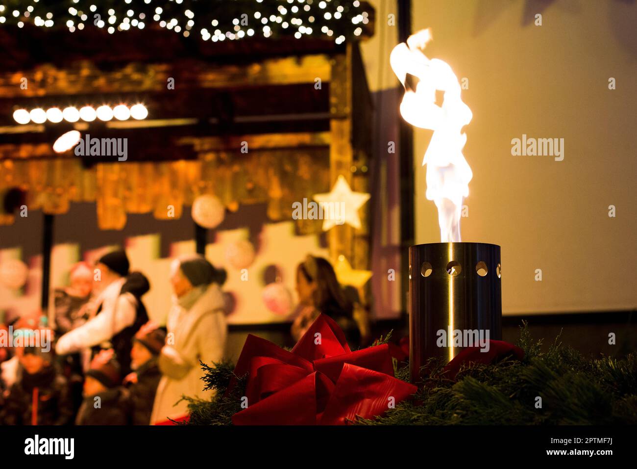 Big advent wreath candle flame at a christmas market in Austria Stock ...