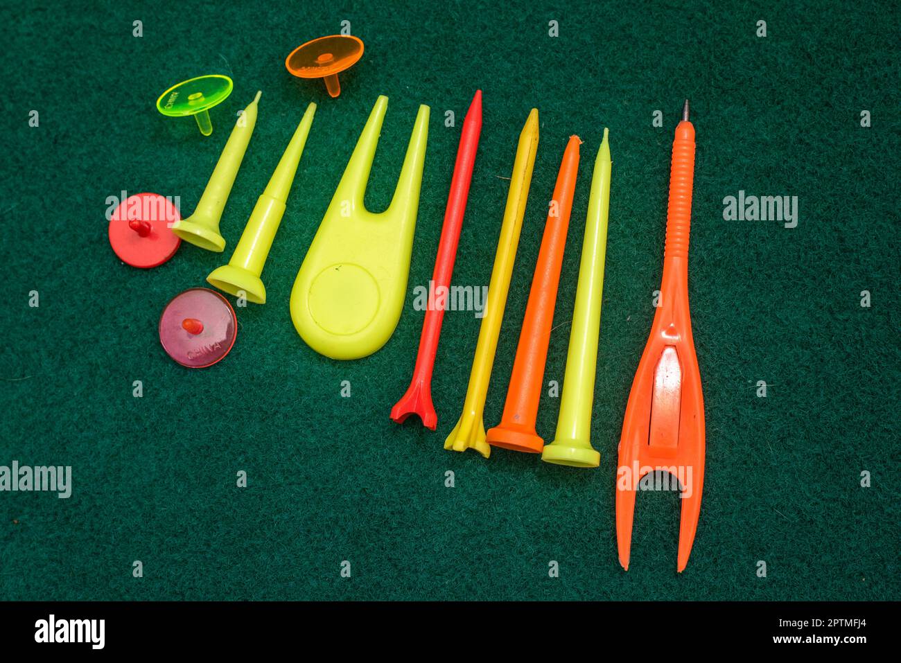 Golfing accessories including Golf cups and TeesPlastic components Stock Photo - Alamy