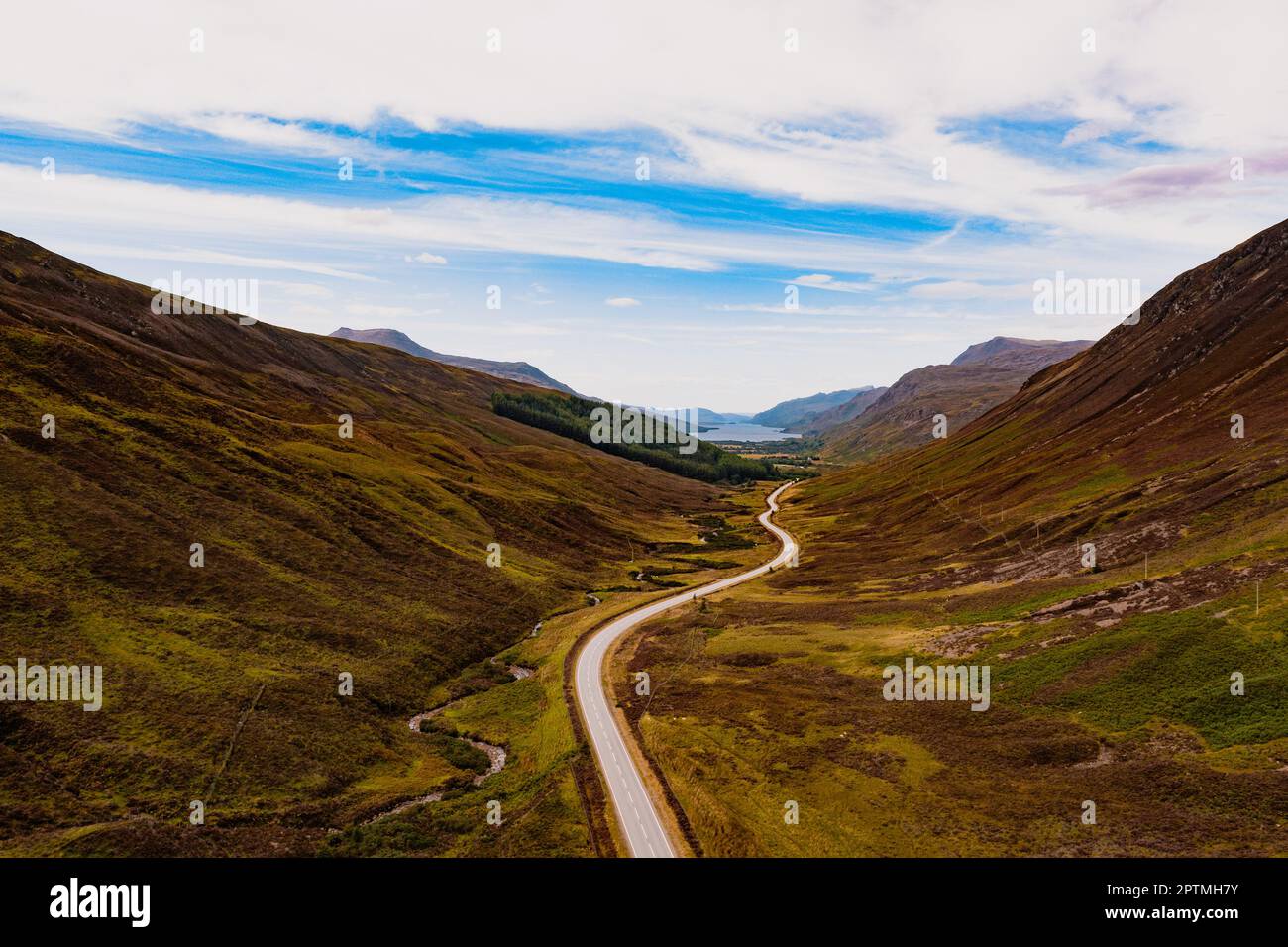Loch Maree viewed from high up Glen Docherty with the road to ...