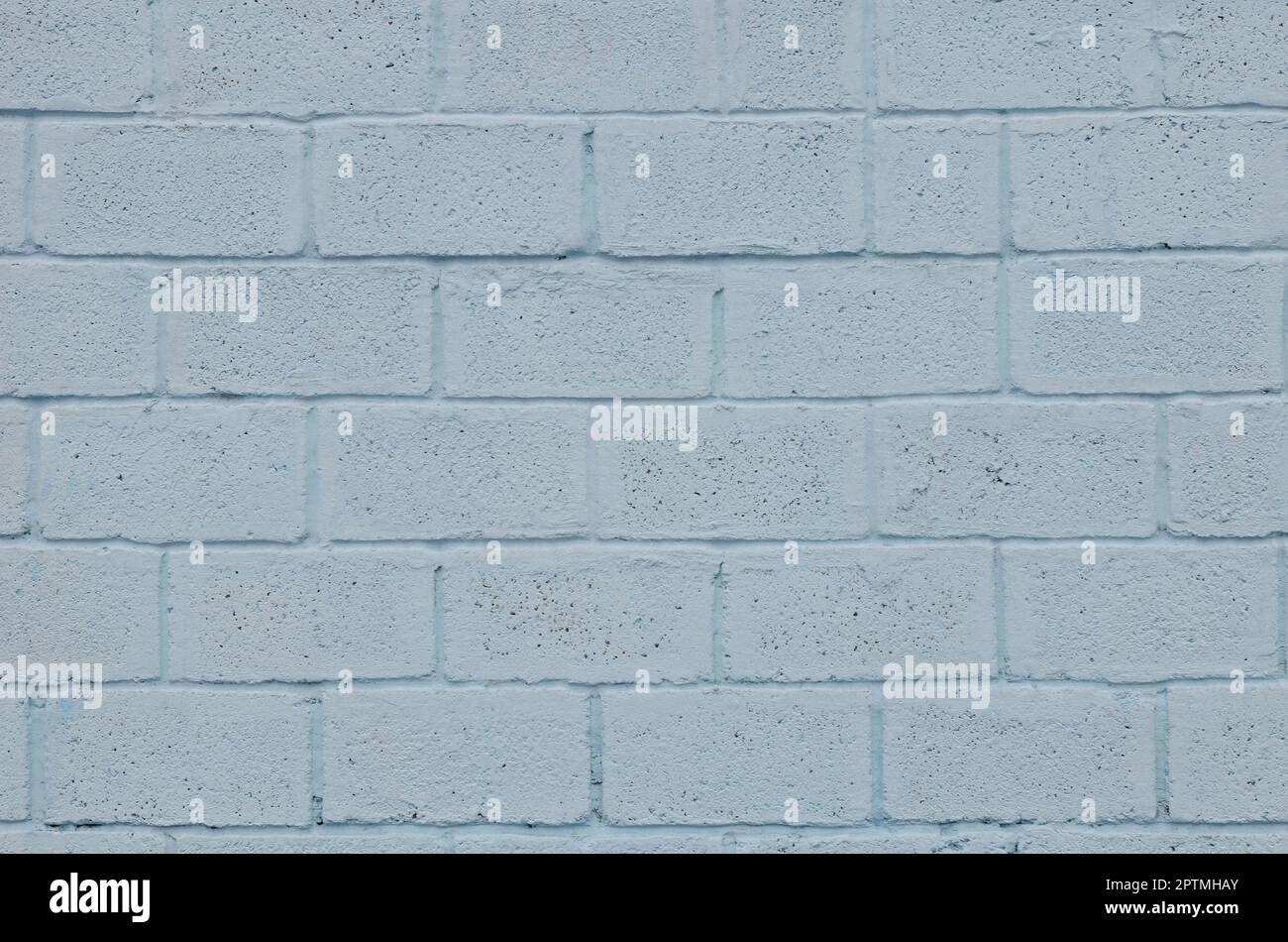 Weathered stained old colored blue block wall background. Texture of an ...