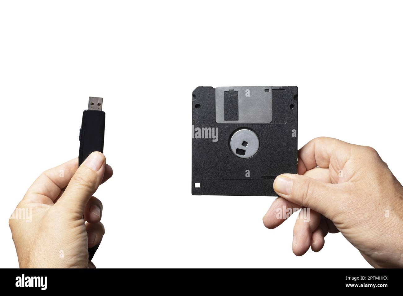 the comparison between an old floppy disk and a USB key for data ...