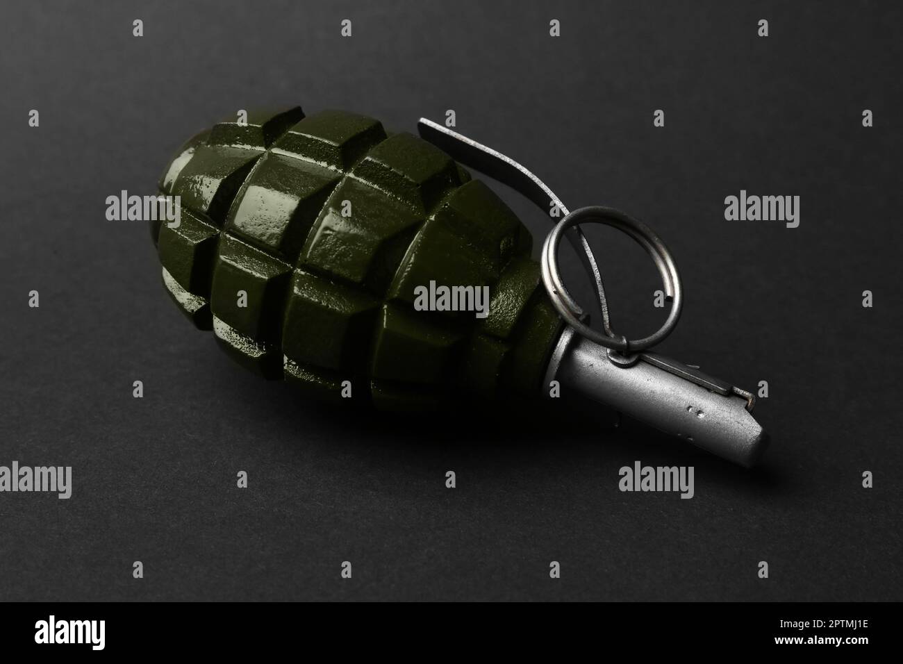 Hand grenade on black background, closeup. Explosive weapon Stock Photo ...