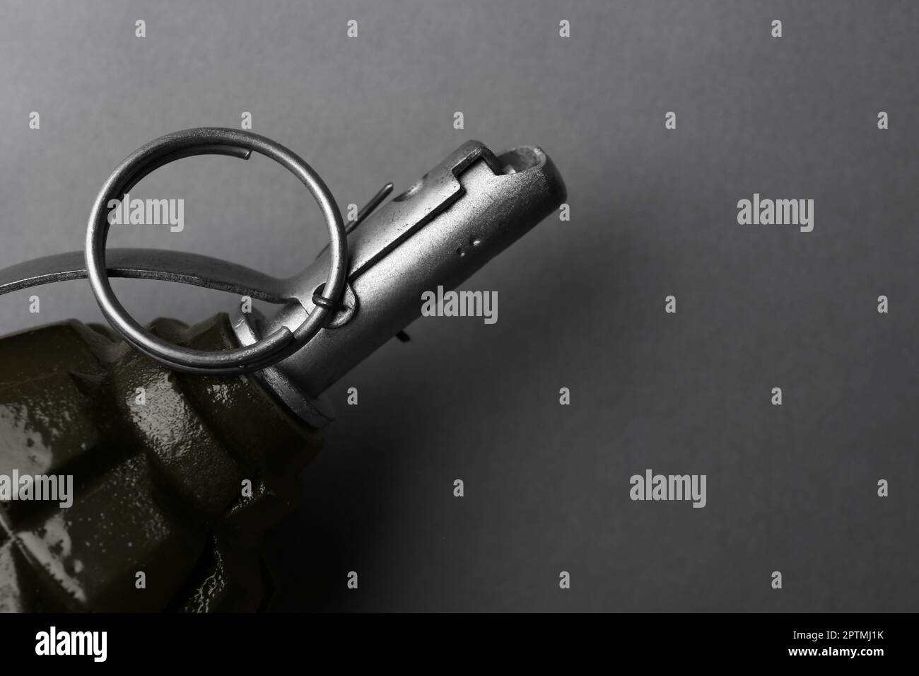 Hand grenade on grey background, closeup. Space for text Stock Photo ...