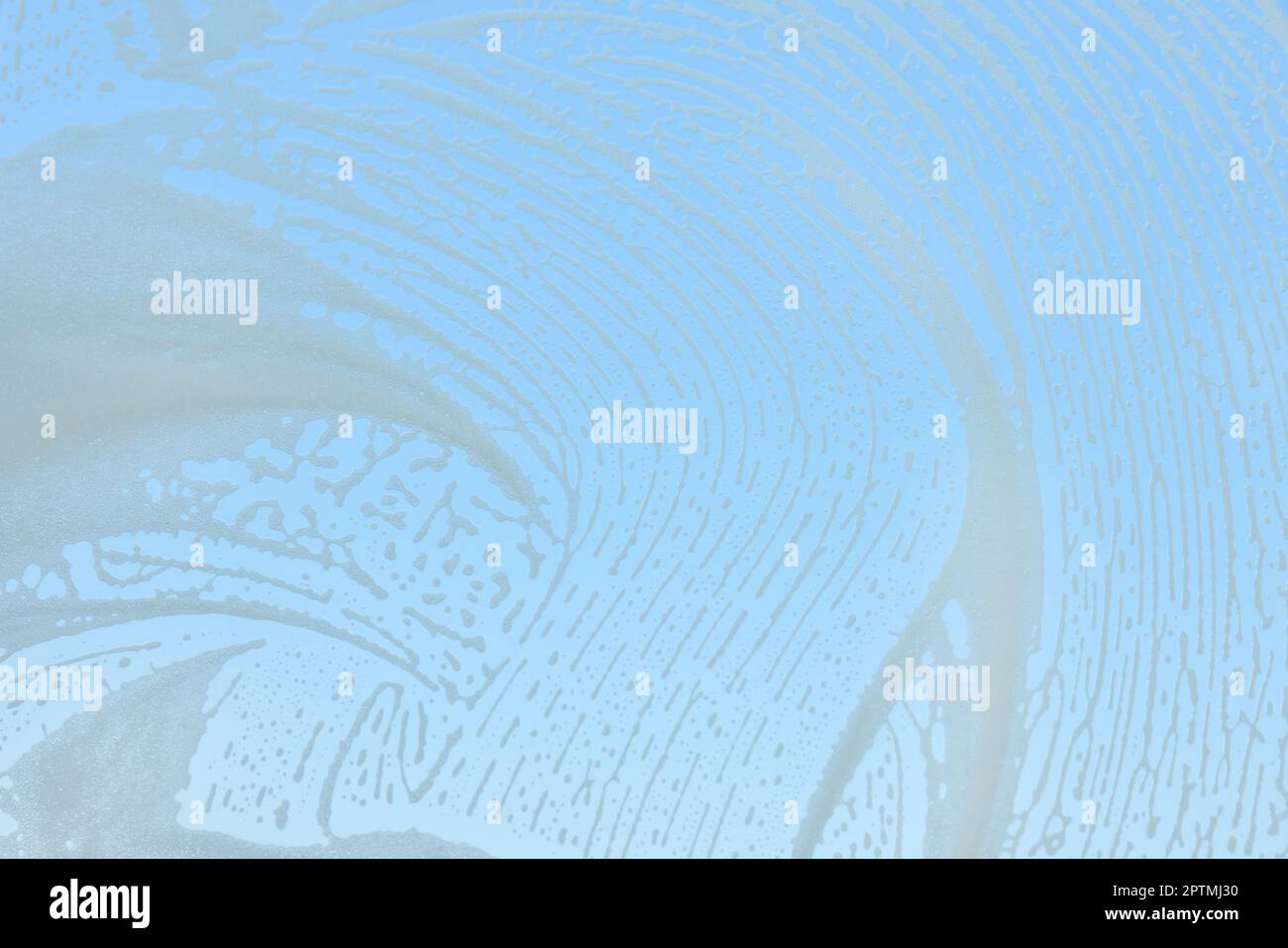 Glass covered with suds as background, view from inside Stock Photo - Alamy