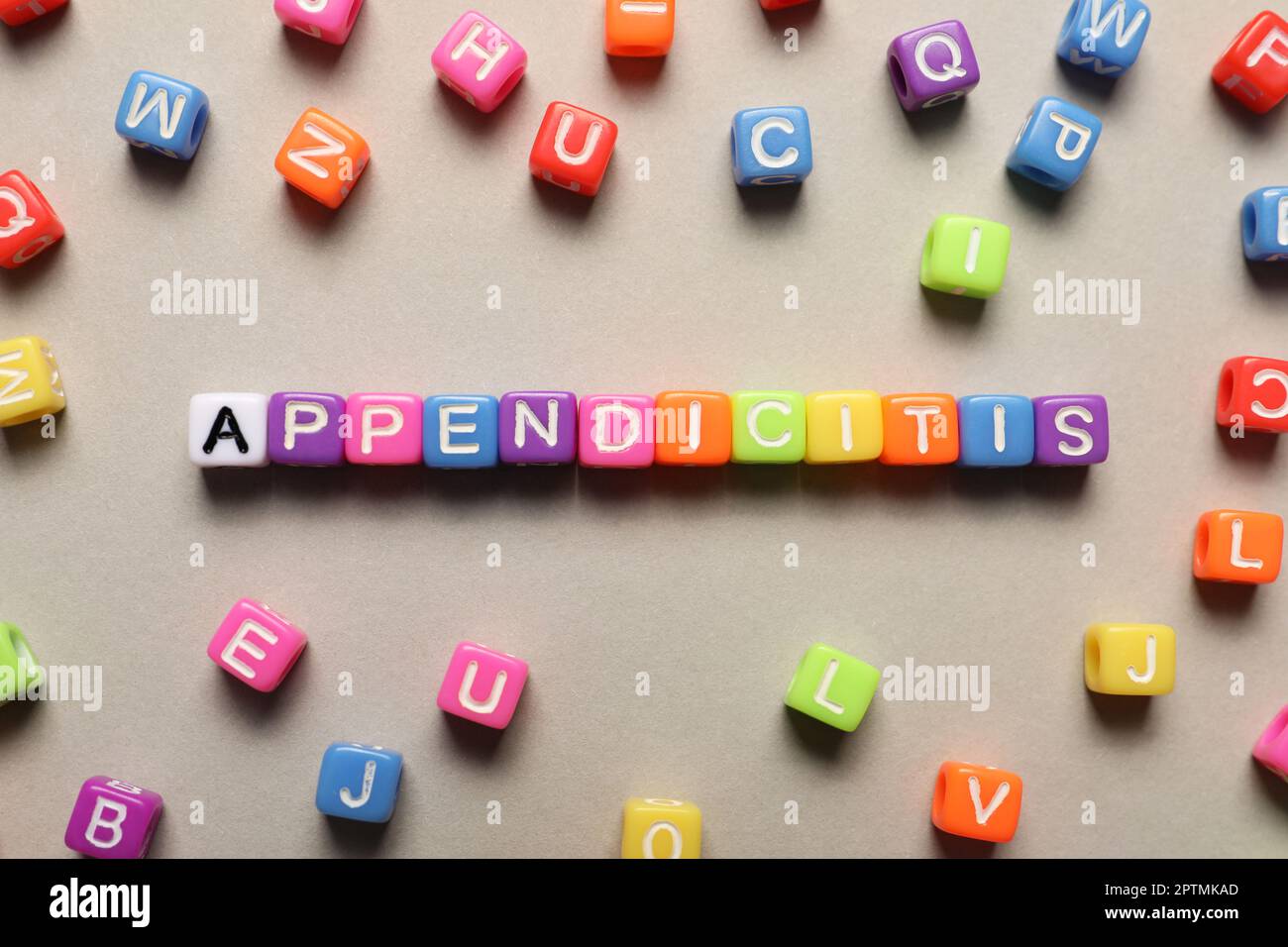 Word Appendicitis made of color cubes with letters on light background ...