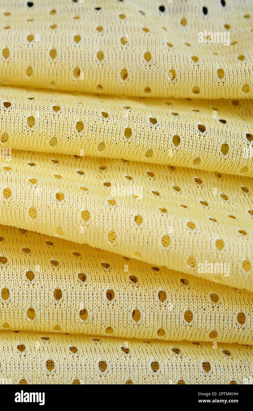 Yellow mesh sport wear fabric textile pattern background. Yellow color ...
